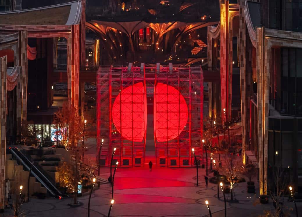 SpY presents "Divided" through a monumental sphere of red light ...